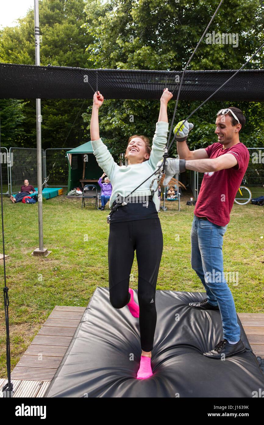 Isabella Mackie dismounting from the net after her first atempt at Trapeze. Ben Sobel helps her ...