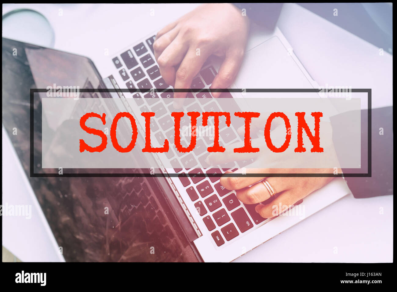 Hand and text SOLUTION with vintage background. Technology concept ...