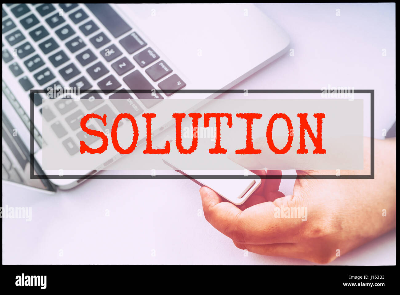 Hand and text SOLUTION with vintage background. Technology concept ...