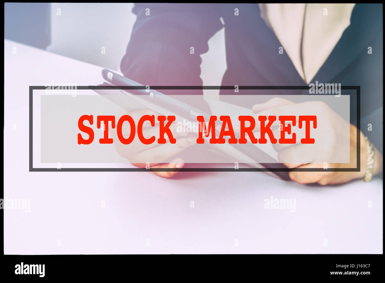 Hand and text STOCK MARKET with vintage background. Technology concept ...
