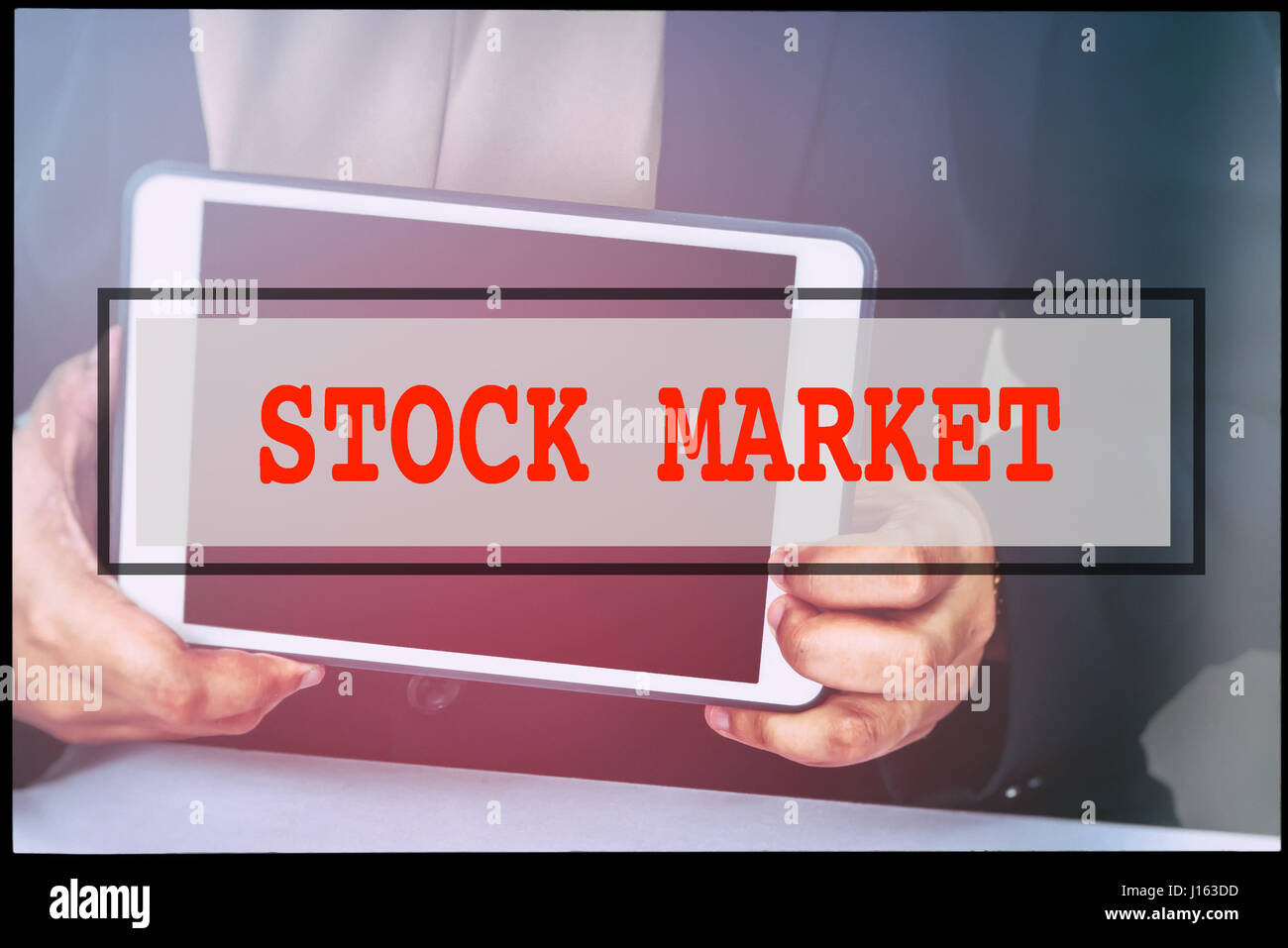Hand and text STOCK MARKET with vintage background. Technology concept ...
