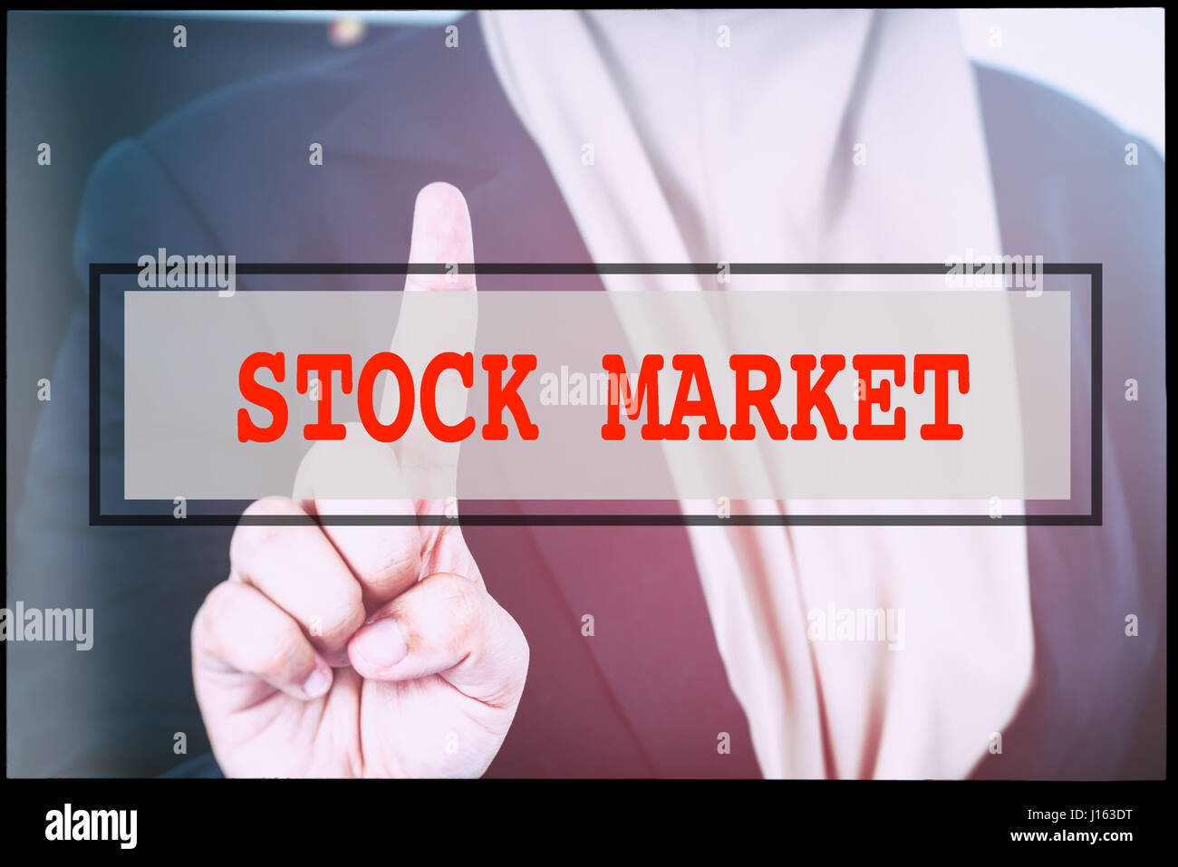 Hand and text STOCK MARKET with vintage background. Technology concept ...