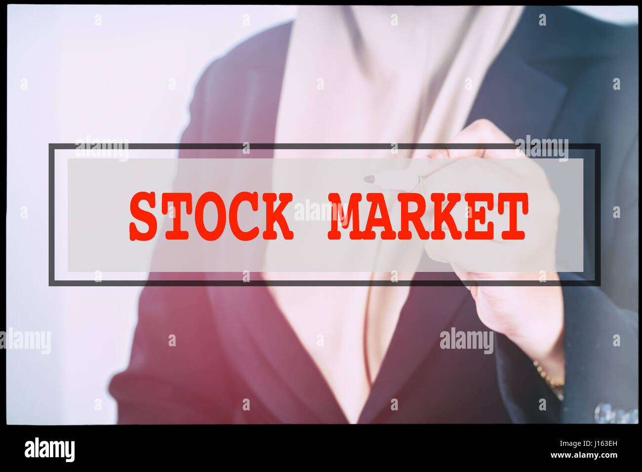 Hand and text STOCK MARKET with vintage background. Technology concept ...