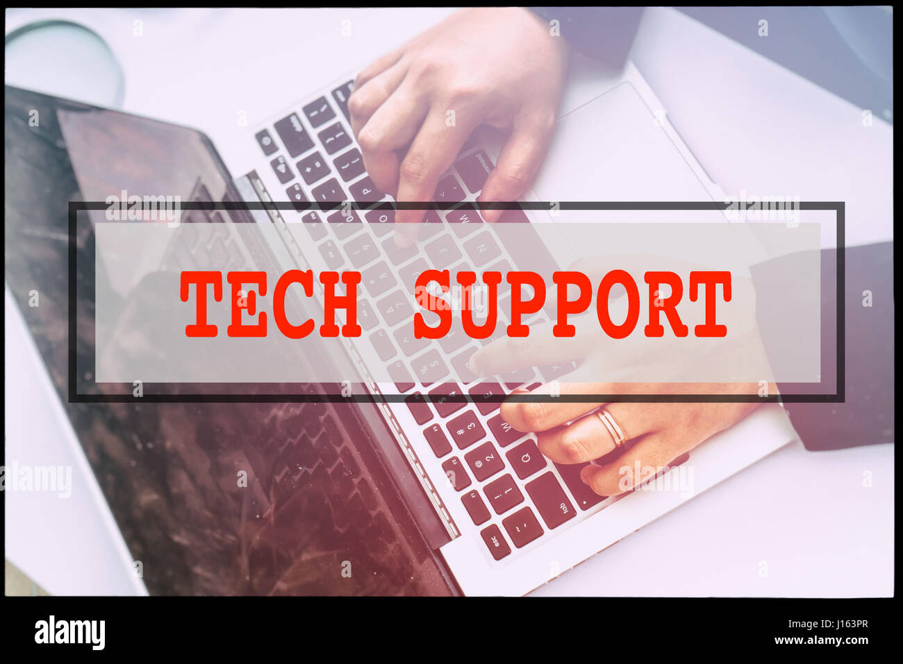 Hand and text TECH SUPPORT with vintage background. Technology concept ...
