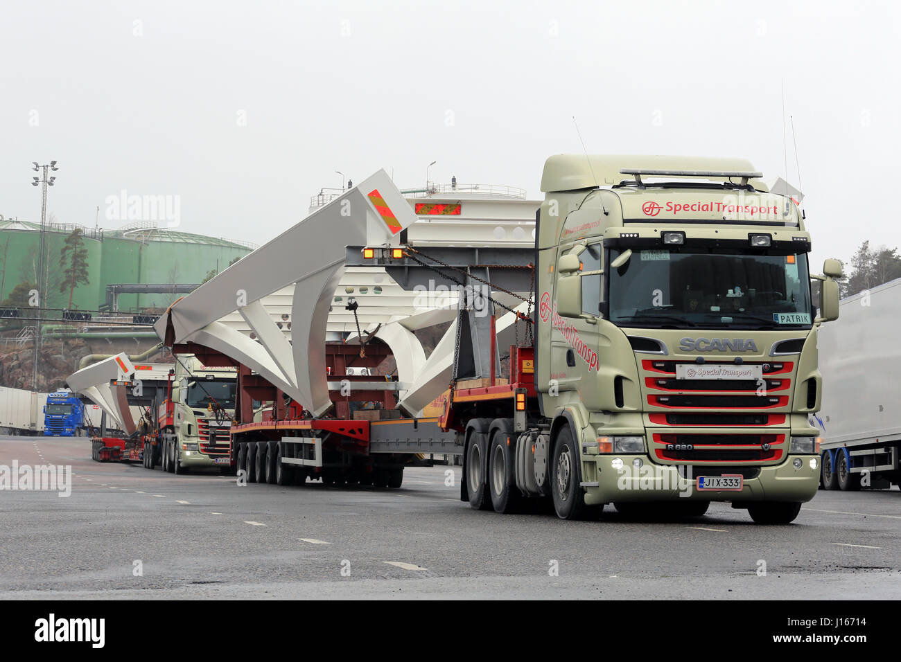 NAANTALI, FINLAND - APRIL 9, 2016: Two Scania R620 trucks which haul ...