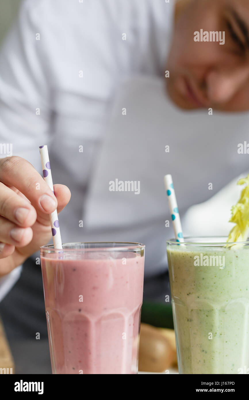 Male chef serving smoothies Stock Photo - Alamy