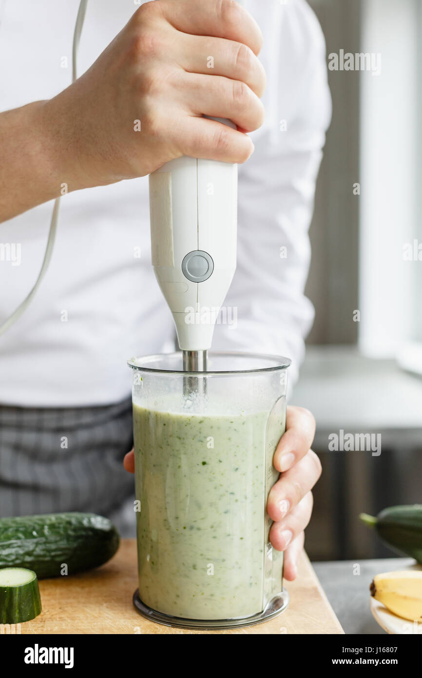 Male chef blending smoothie Stock Photo - Alamy
