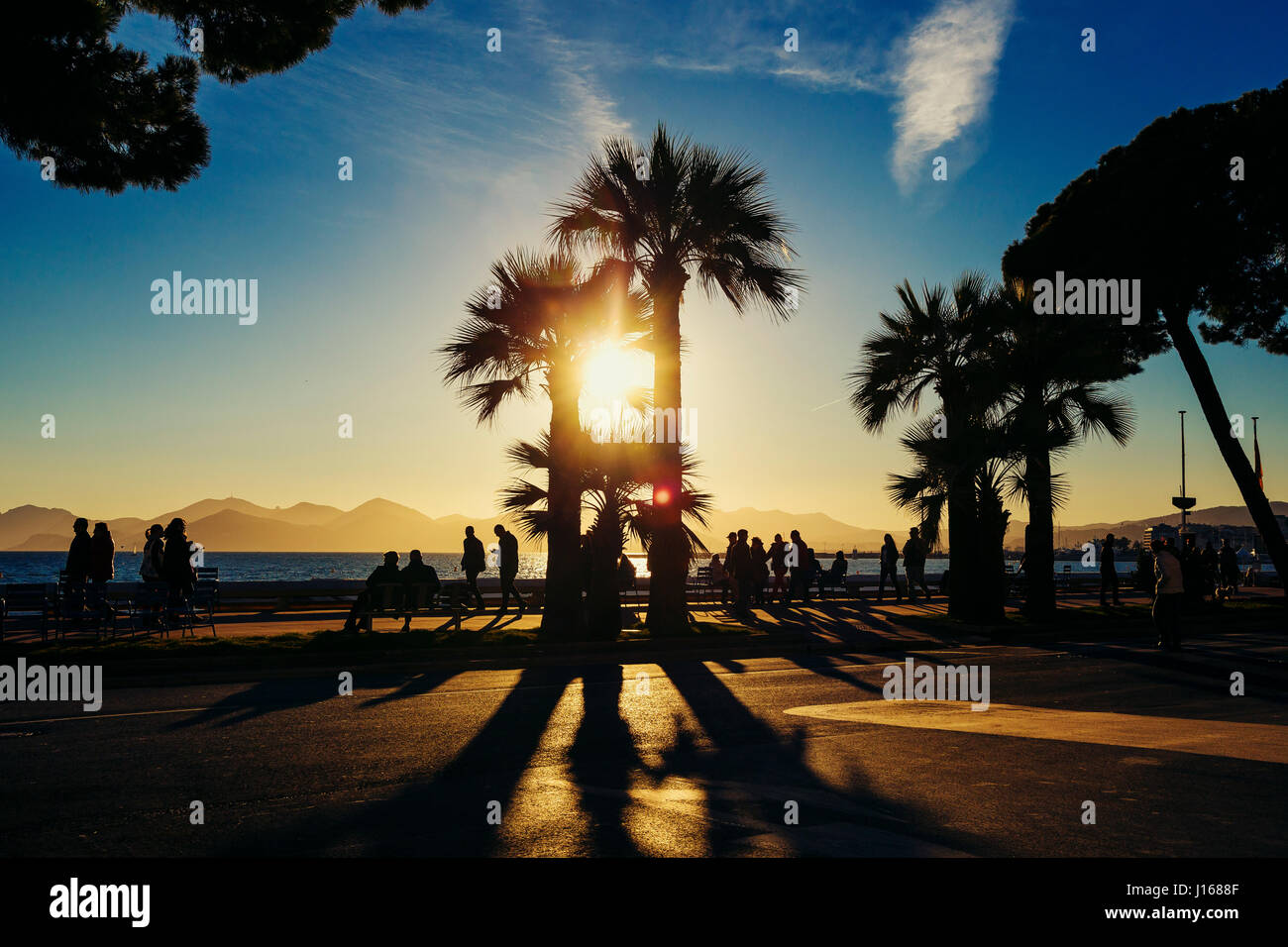 CANNES, FRANCE - 20 February, 2016: Dramatic winter sunset with blue ...