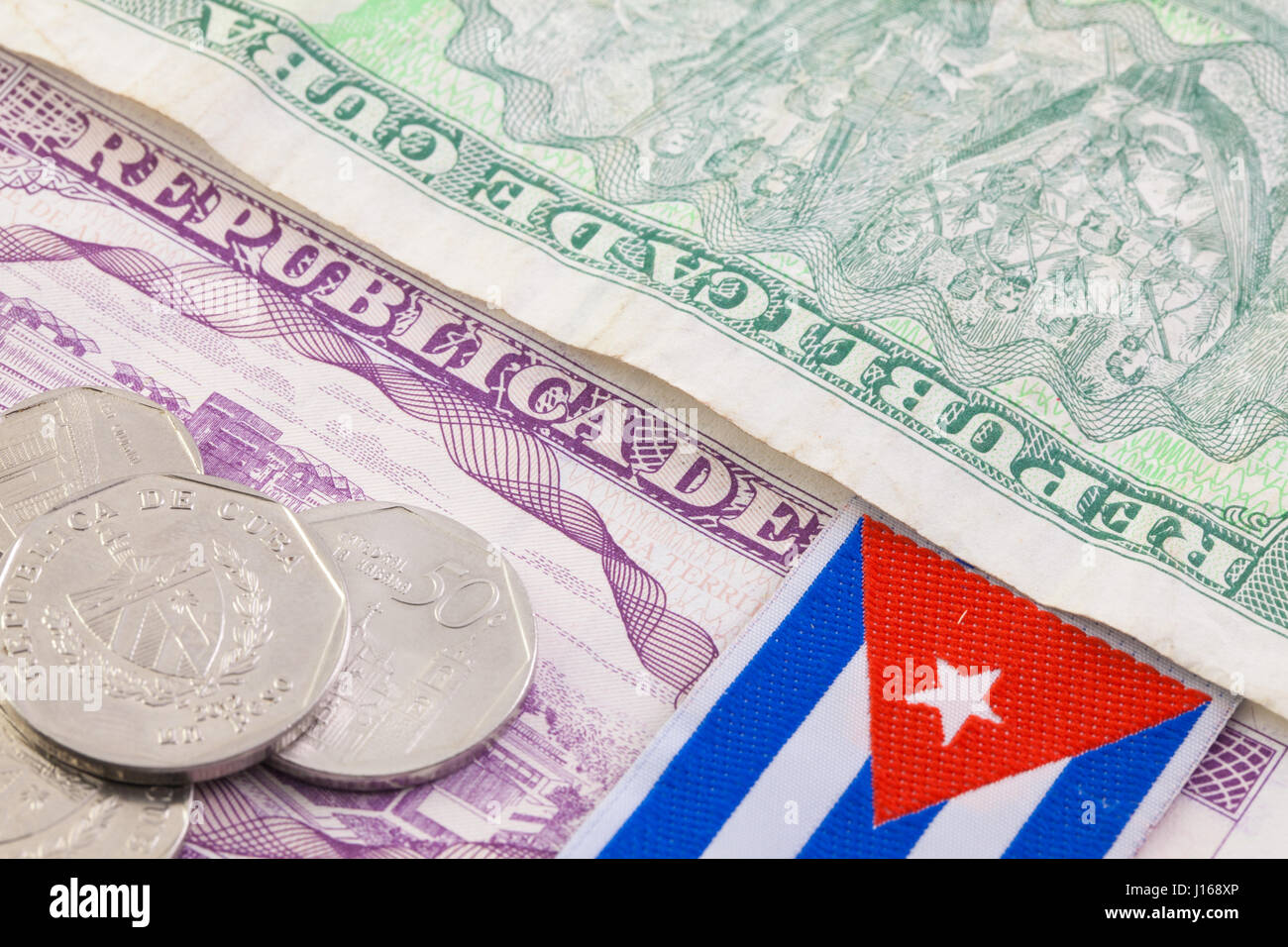 Different cuban banknotes and coins on the table Stock Photo - Alamy