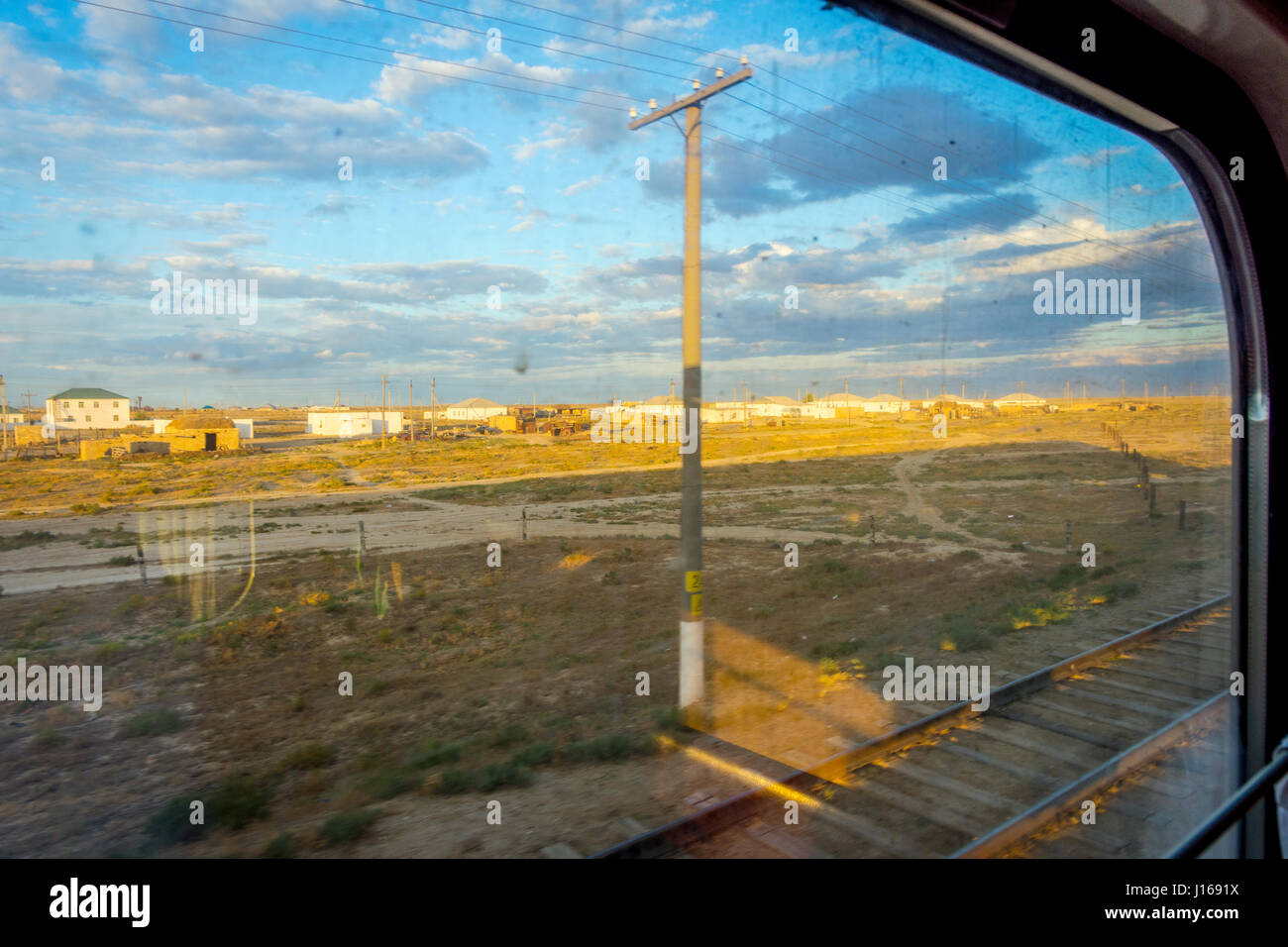 Small village thru the train window, Karakalpakstan autonomous region ...