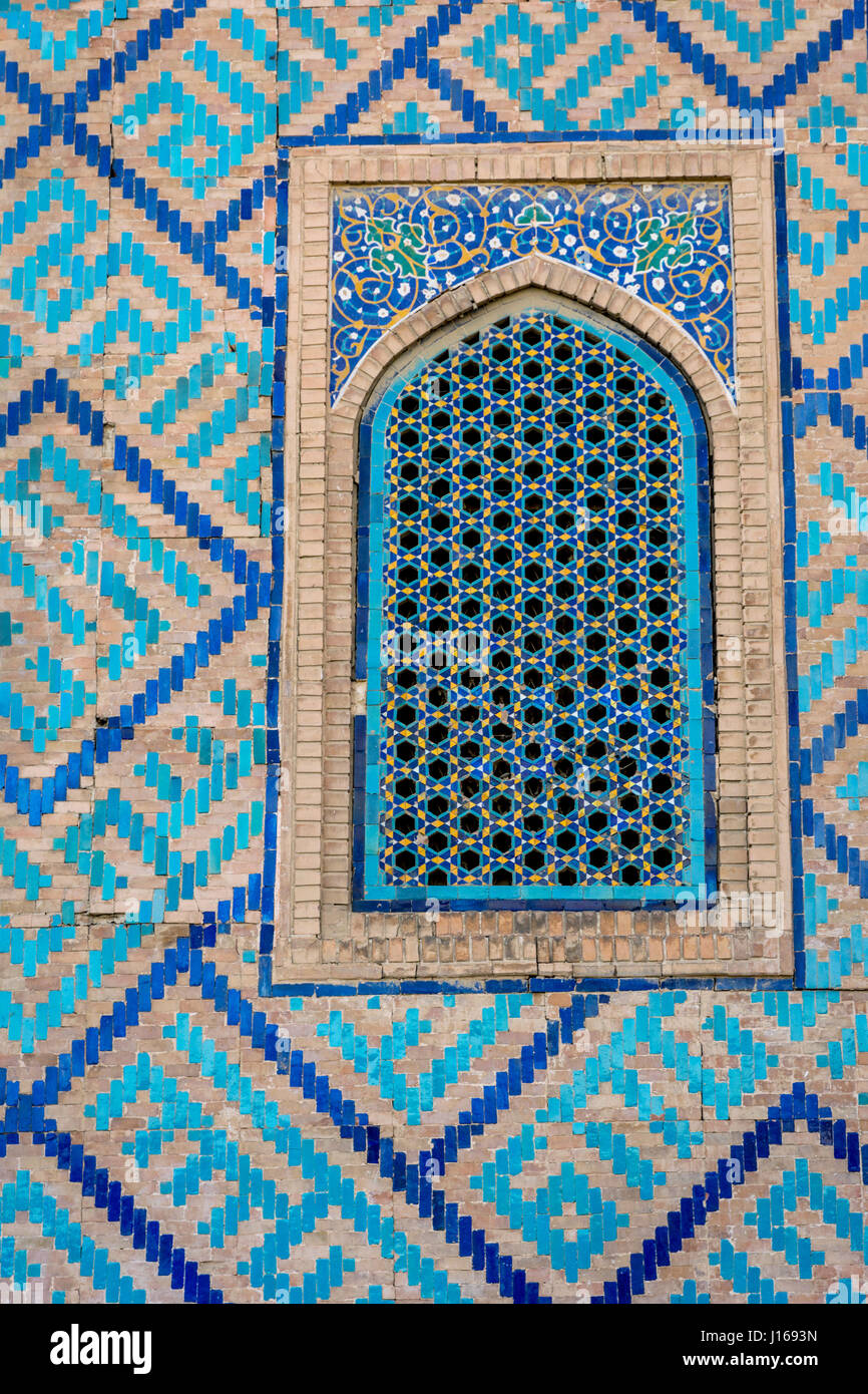 Detail of window on the wall with blue tiles pattern of Samarkand ...