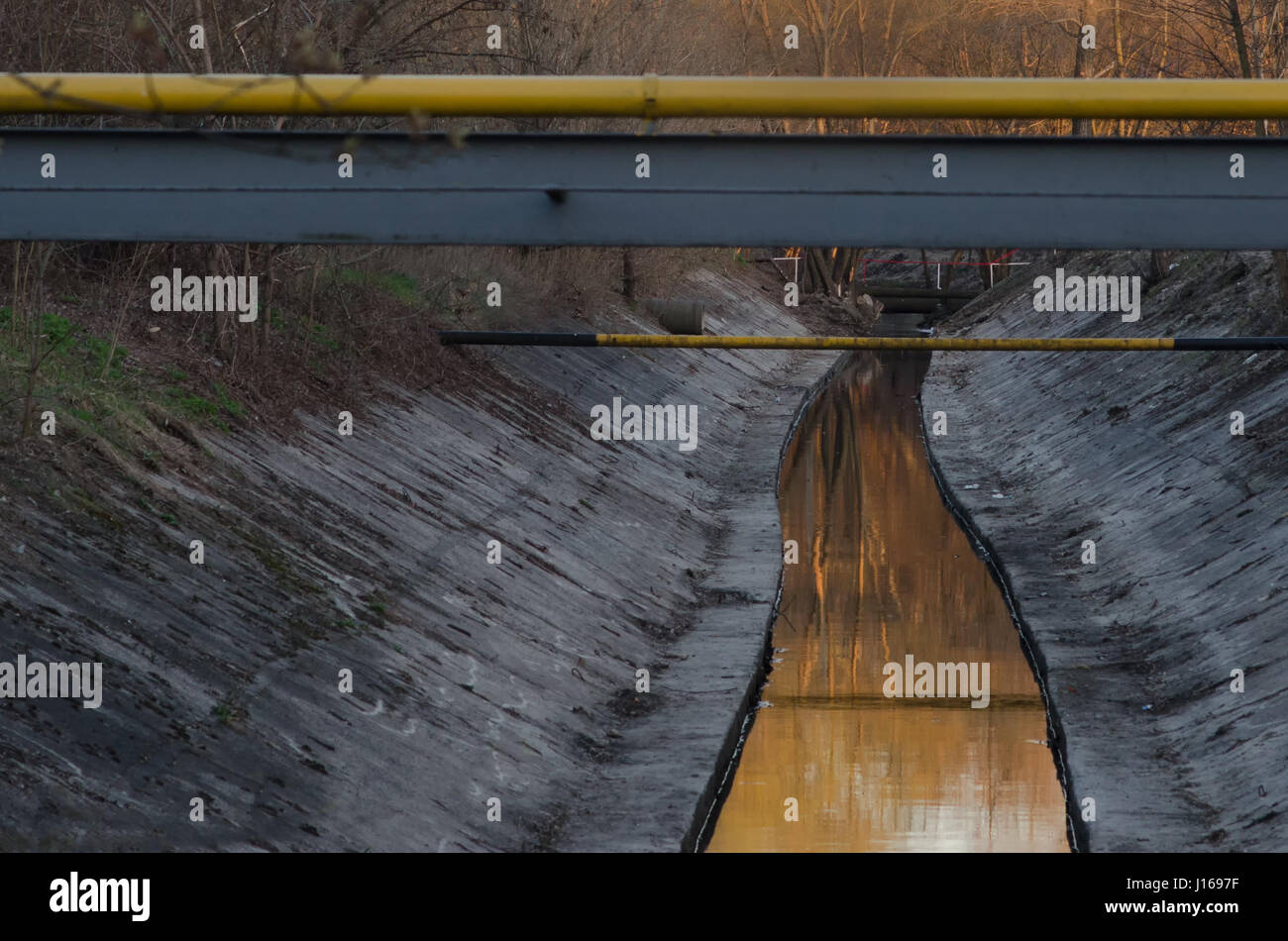 Urban river in the city sunset Stock Photo - Alamy