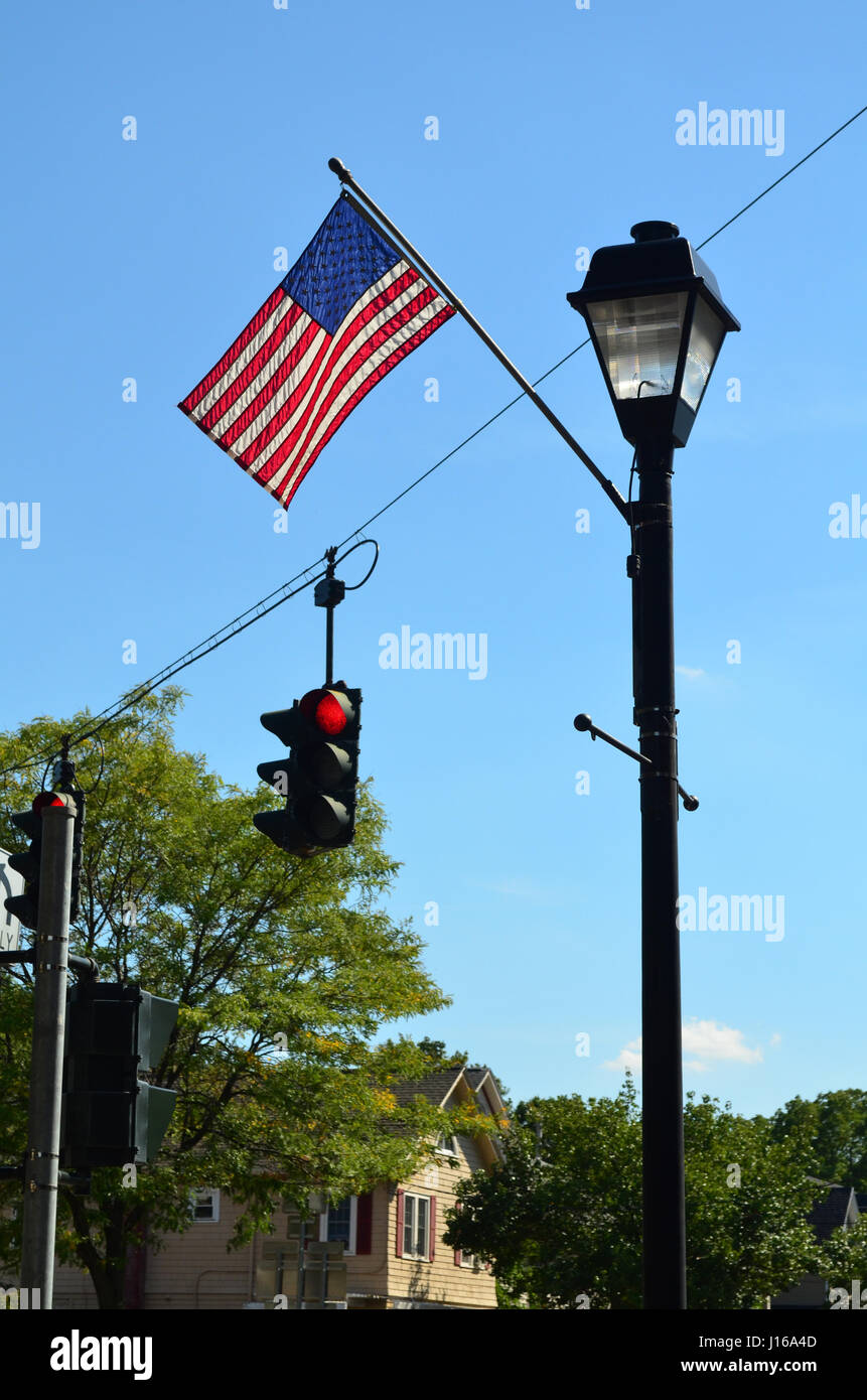 USA flag attached to lamppost Stock Photo - Alamy