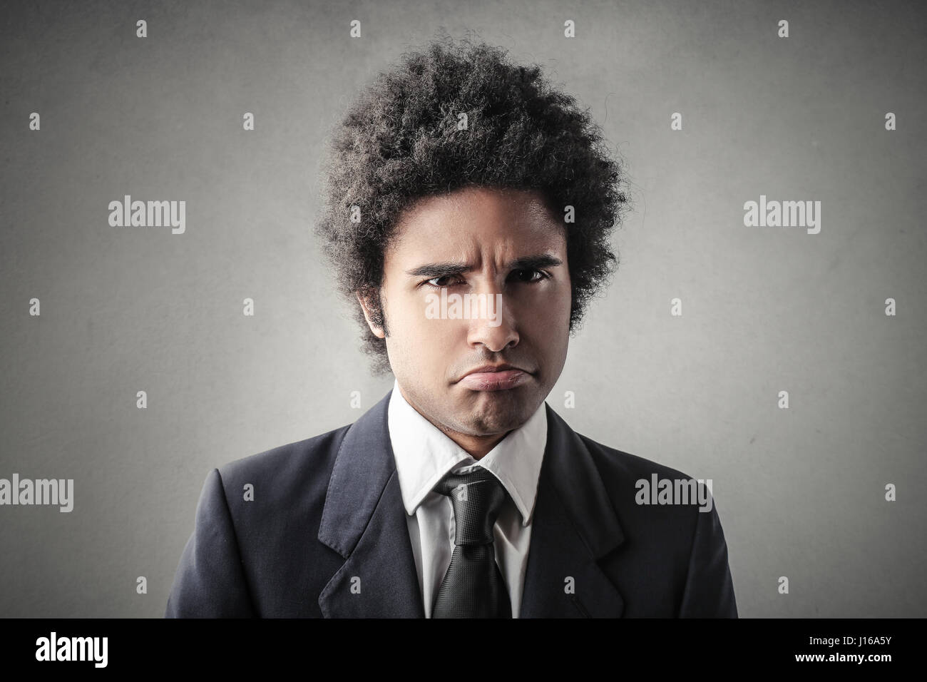 Young man making a sad face Stock Photo - Alamy