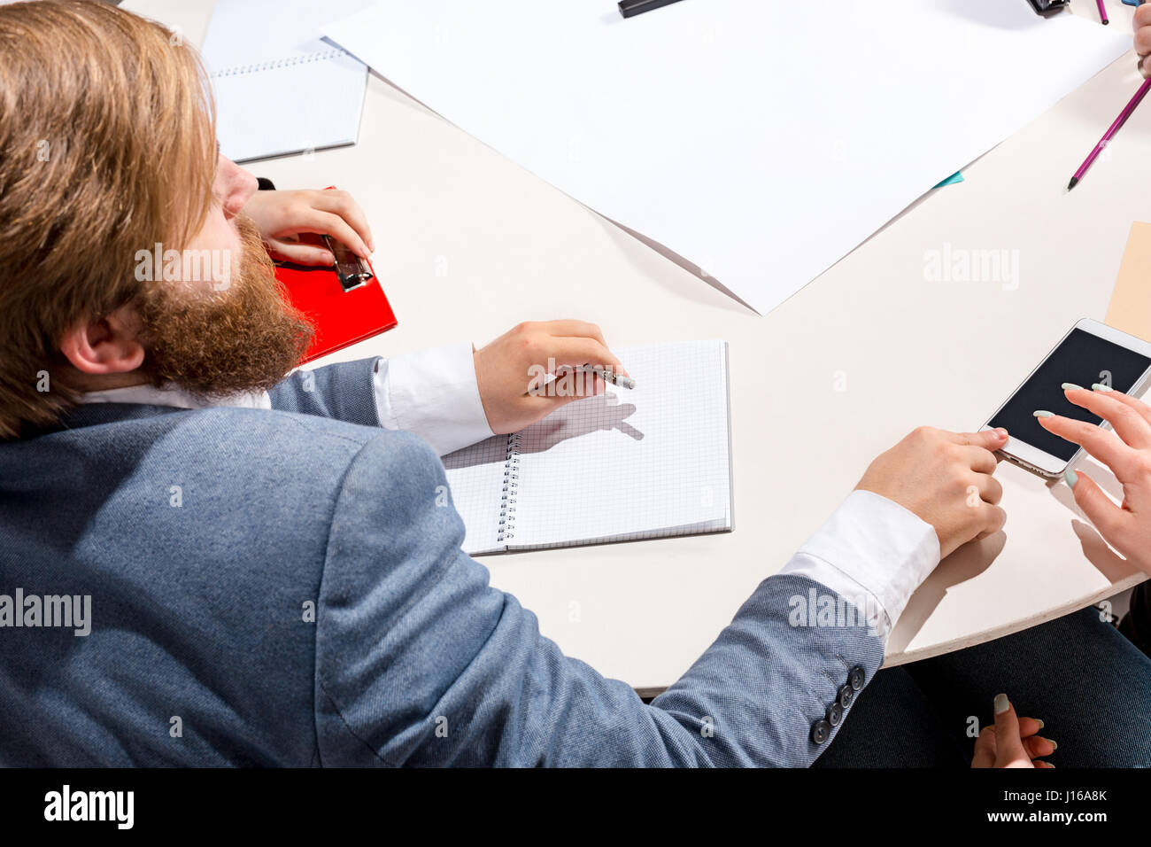 Office life man desk checking hi-res stock photography and images - Alamy