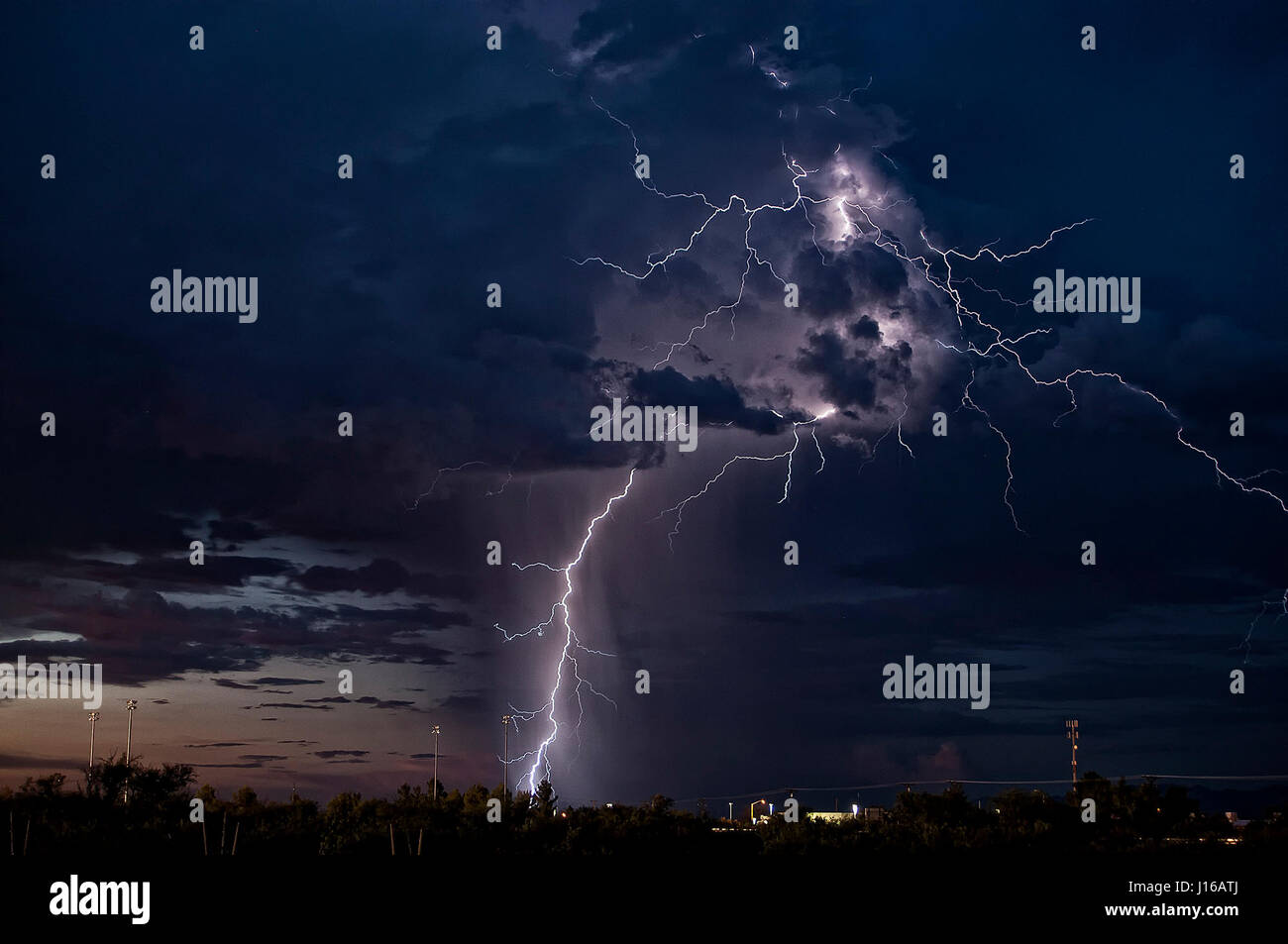 ARIZONA, USA: Lightning strikes over desert skyline. A TECHNICIAN’S ...