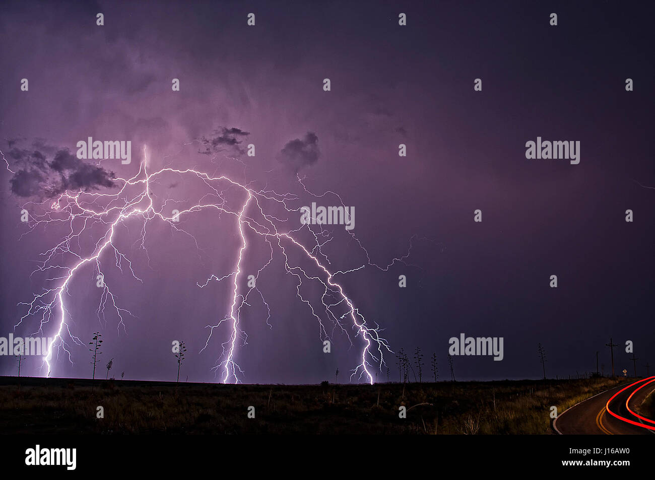 ARIZONA, USA: Lightning strikes over desert skyline. A TECHNICIAN’S ...