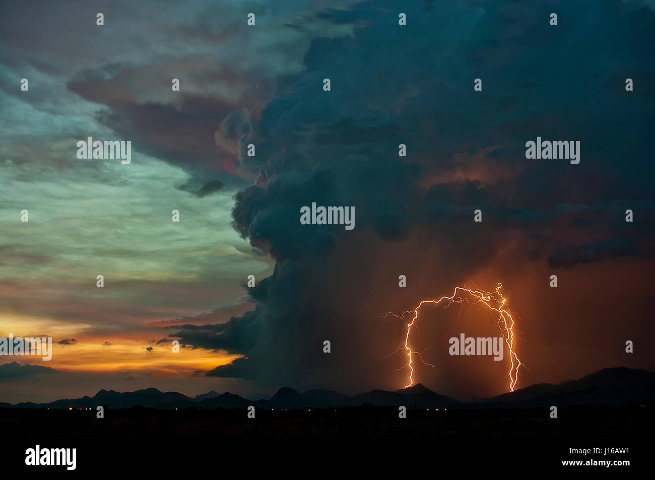 ARIZONA, USA: Lightning strikes over desert skyline. A TECHNICIAN’S ...