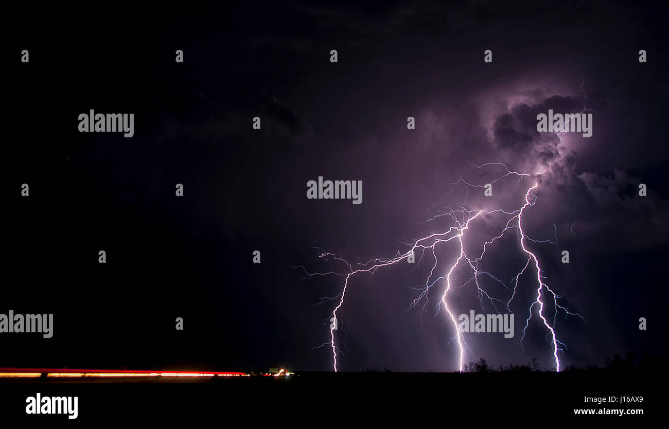 ARIZONA, USA: Lightning strikes over desert skyline. A TECHNICIAN’S ...