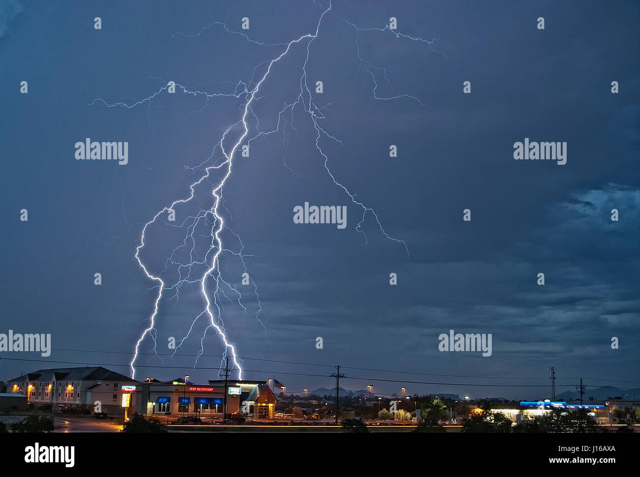 ARIZONA, USA: Lightning strikes over desert skyline. A TECHNICIAN’S ...