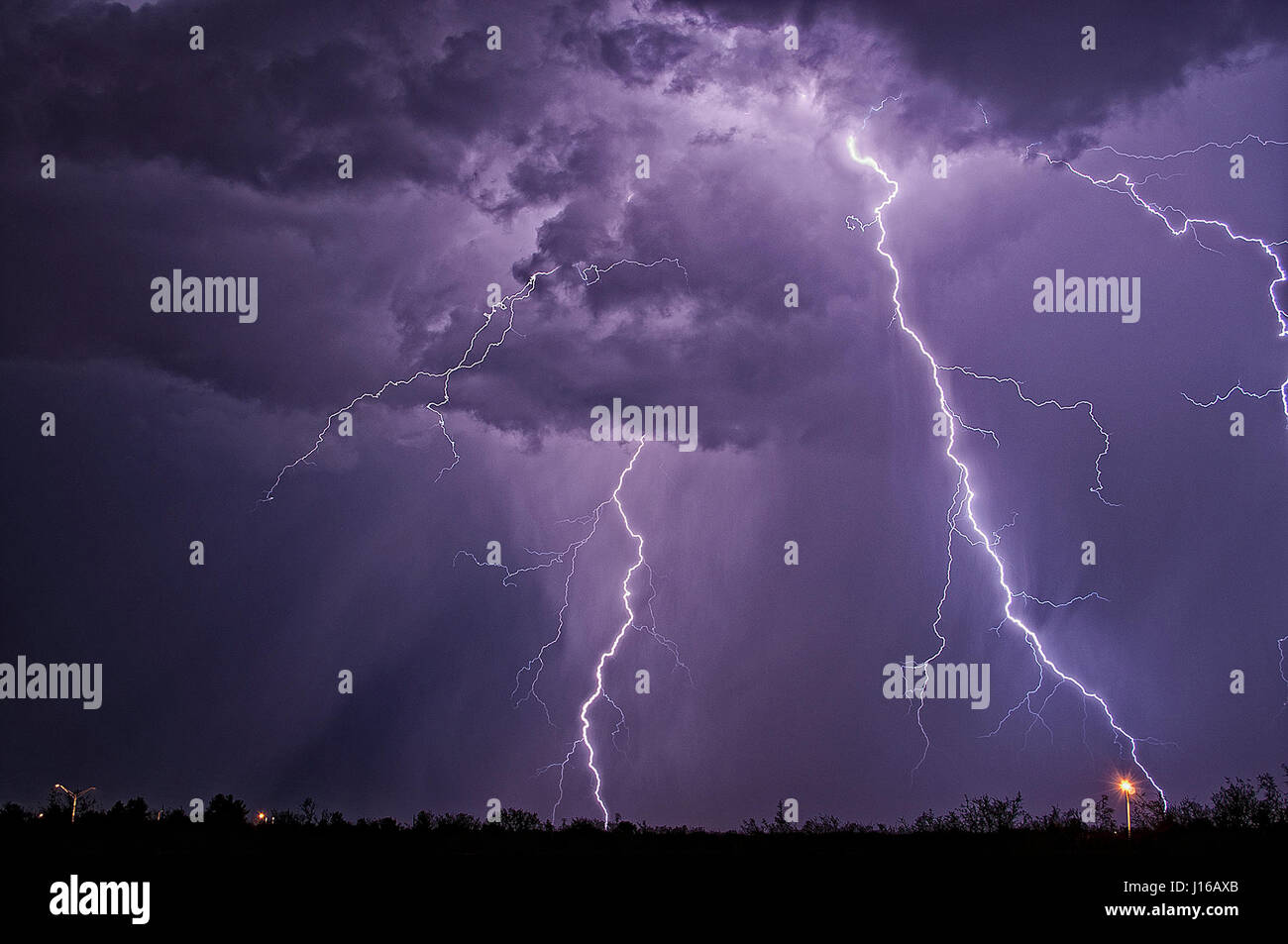 ARIZONA, USA: Lightning strikes over desert skyline. A TECHNICIAN’S ...
