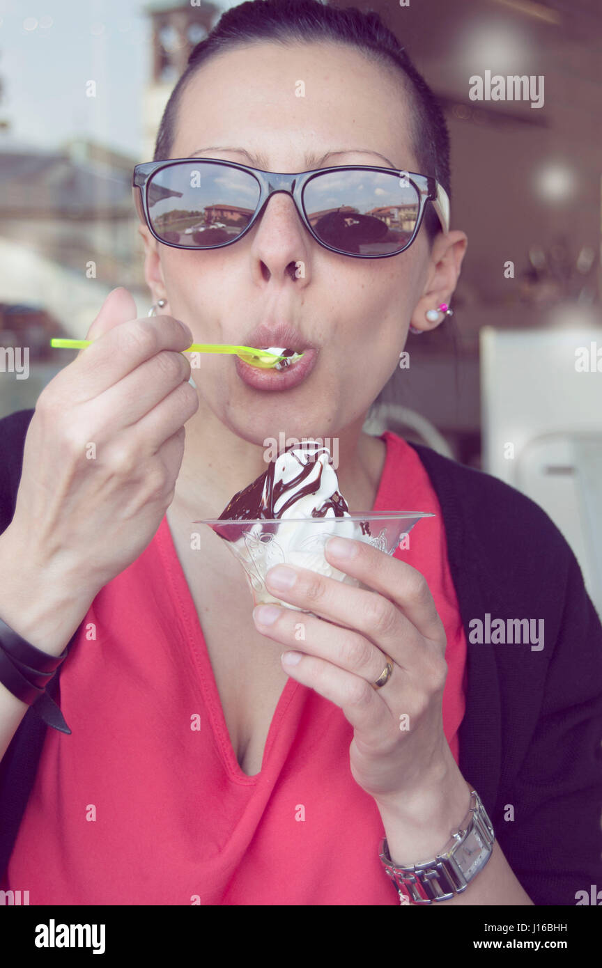 Woman Eating Frosting