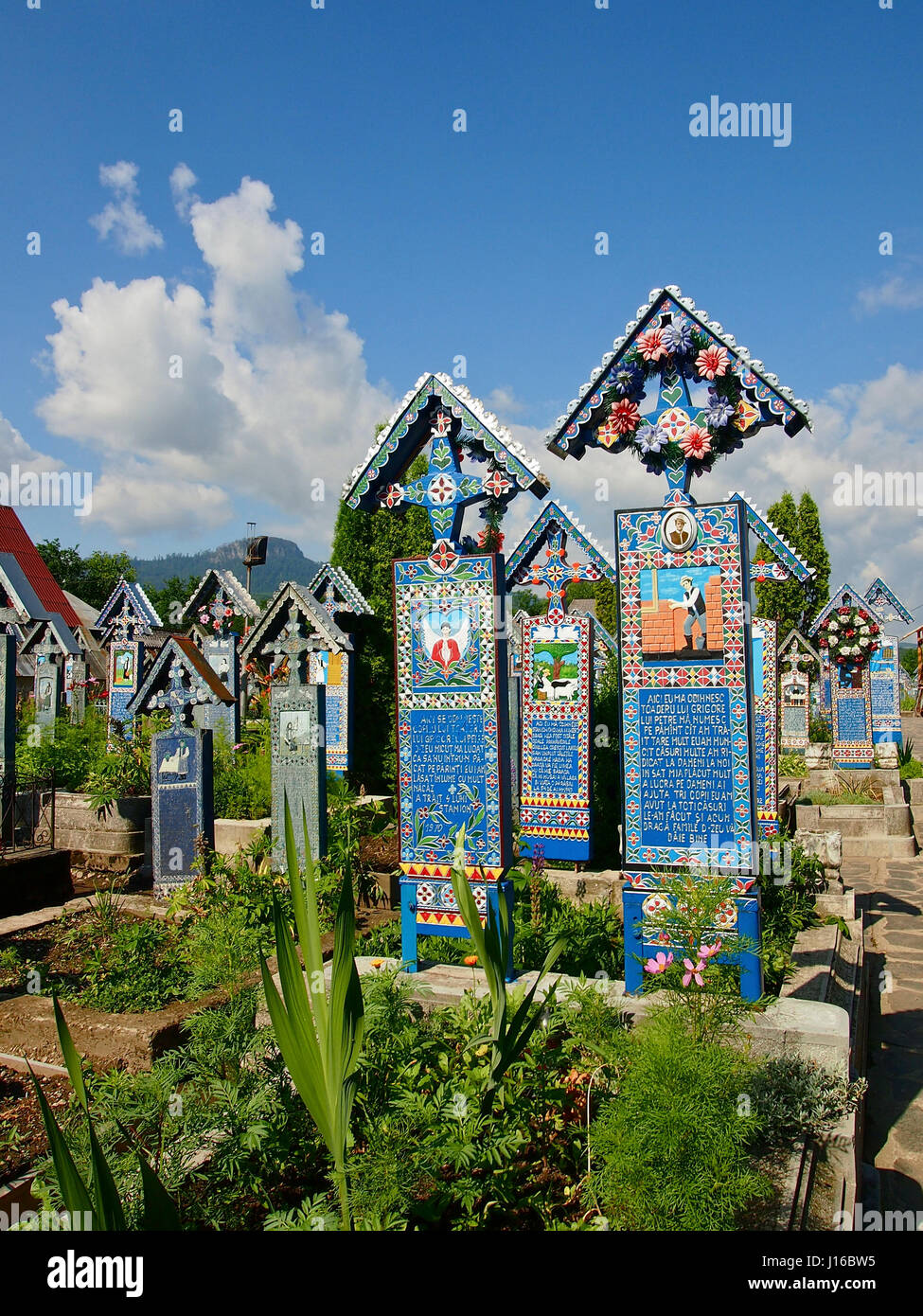 SAPANTA, ROMANIA: Bizarre headstones at the Merry Cemetery shows both ...