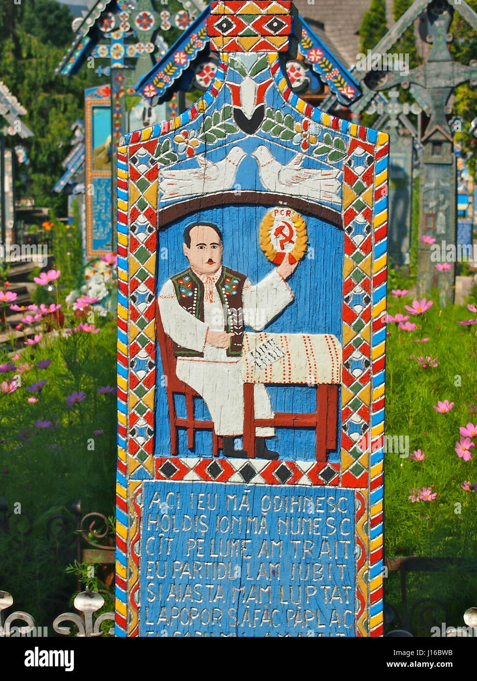 SAPANTA, ROMANIA: Bizarre headstones at the Merry Cemetery shows both ...