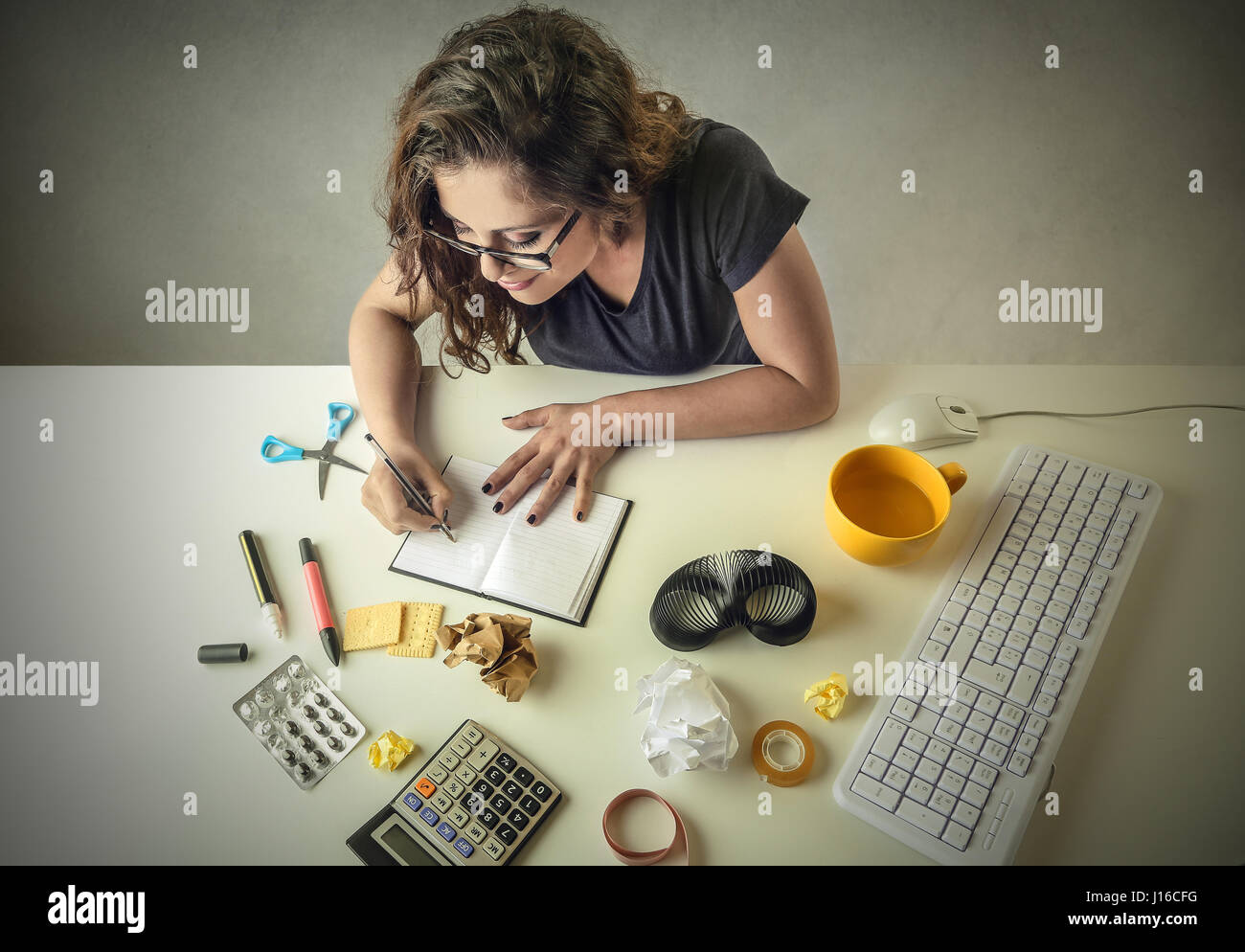 Beautiful office girl taking notes hi-res stock photography and images ...
