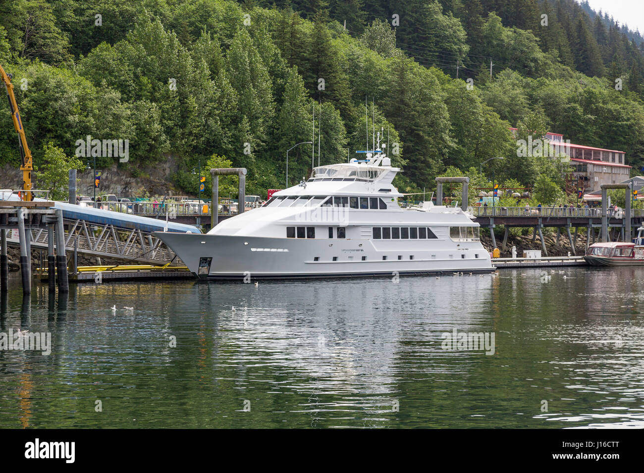 A massive white yacht docked in Juneau Alaska Stock Photo - Alamy