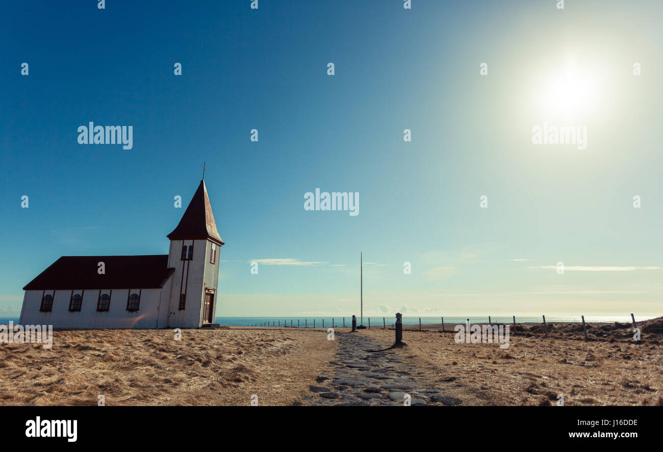 The sun beats down over the church in Hellnar, a fishing village on the ...