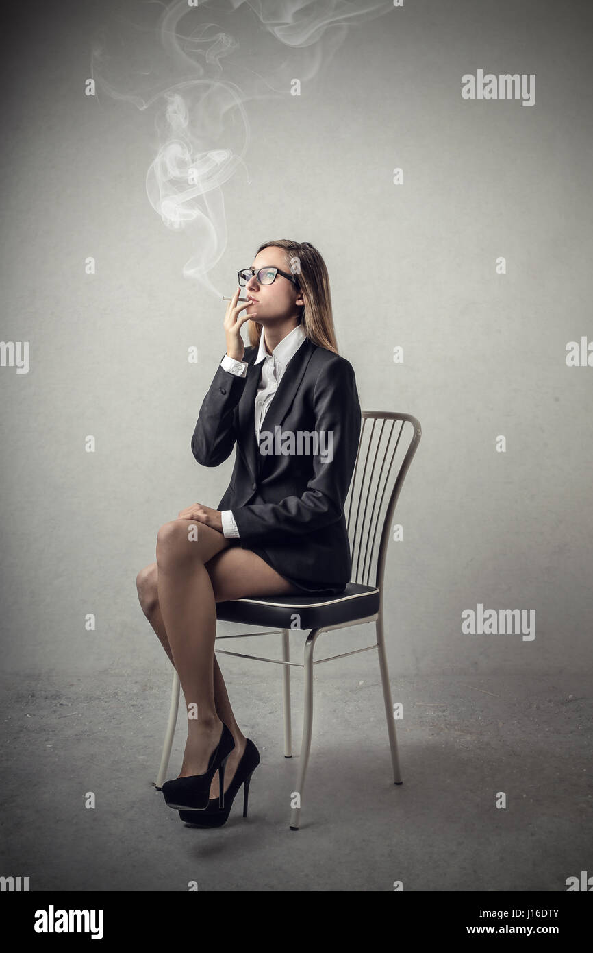 Blonde girl smoking hi-res stock photography and images - Alamy