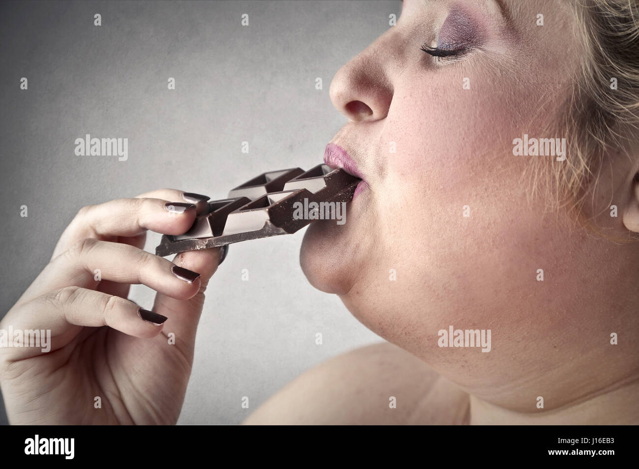Obese woman eating hi-res stock photography and images - Alamy