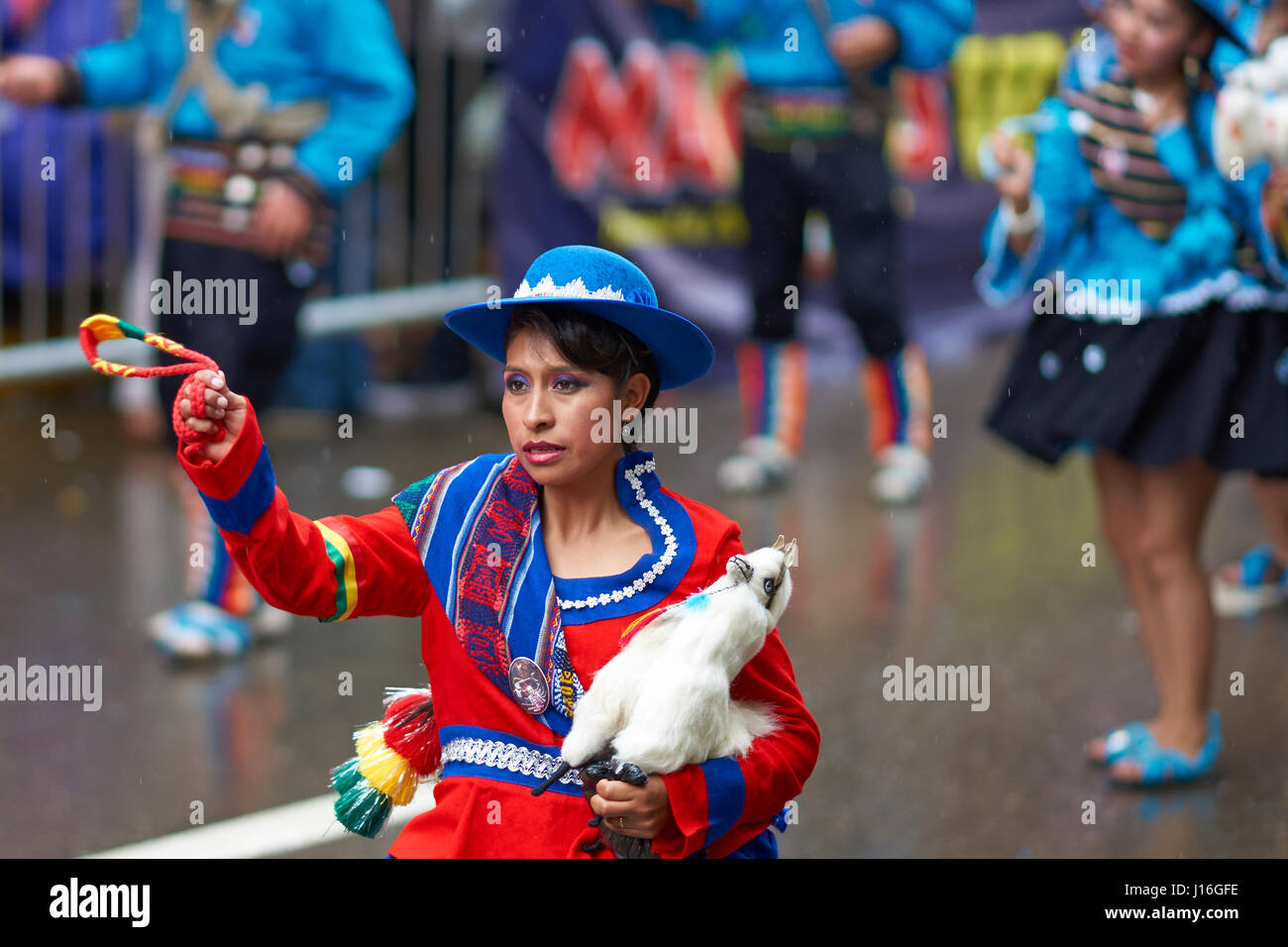 Llamerada dancers in ornate costumes performing as they parade through ...