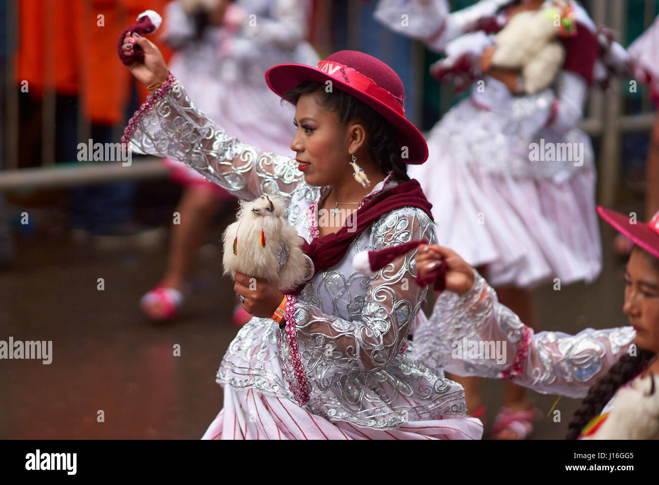 Llamerada dancers in ornate costumes performing as they parade through ...