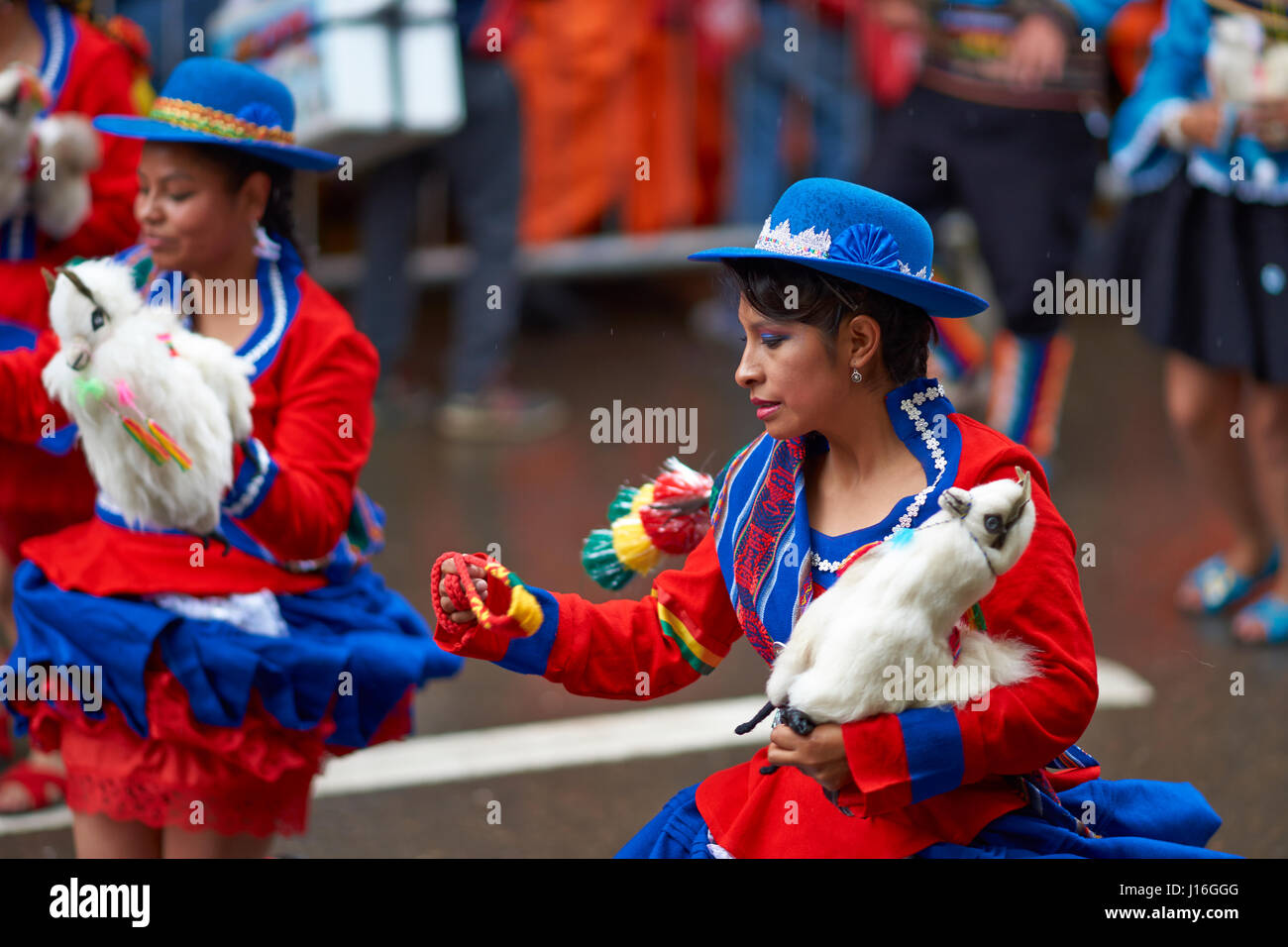 Llamerada dancers in ornate costumes performing as they parade through ...