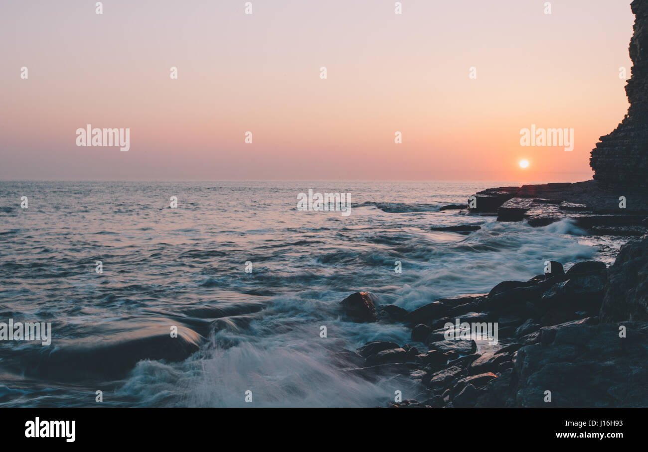 Coastal Sunset in Wales Stock Photo - Alamy
