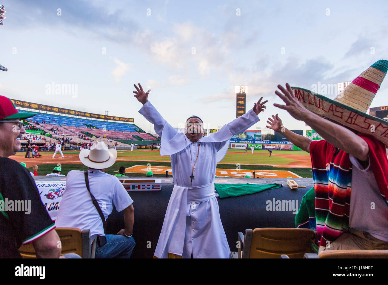 A Fan Dressed As The Pope Cheers For Team Mexico At La Serie Caribe, An ...