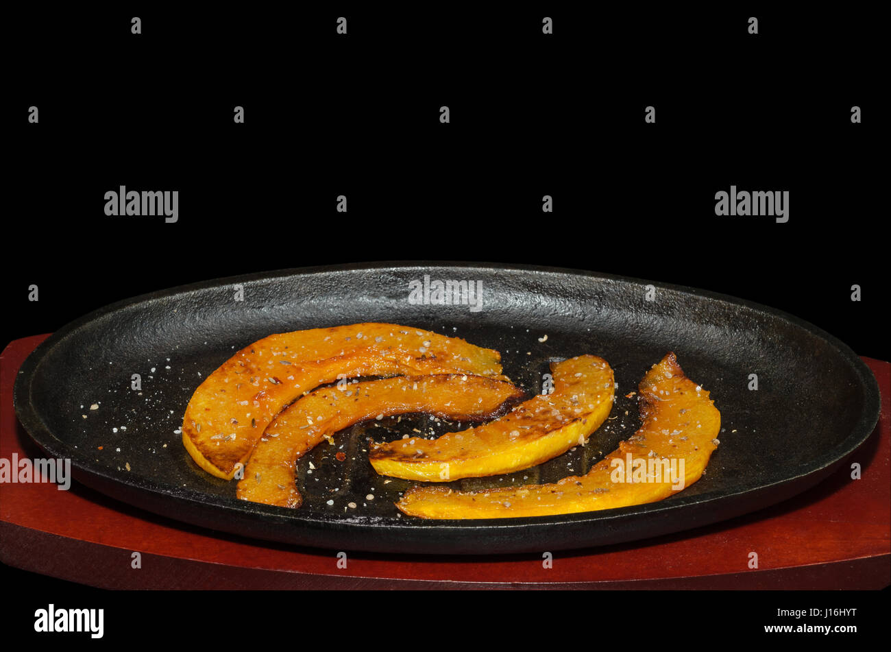 Fried chunks of pumpkin Stock Photo - Alamy