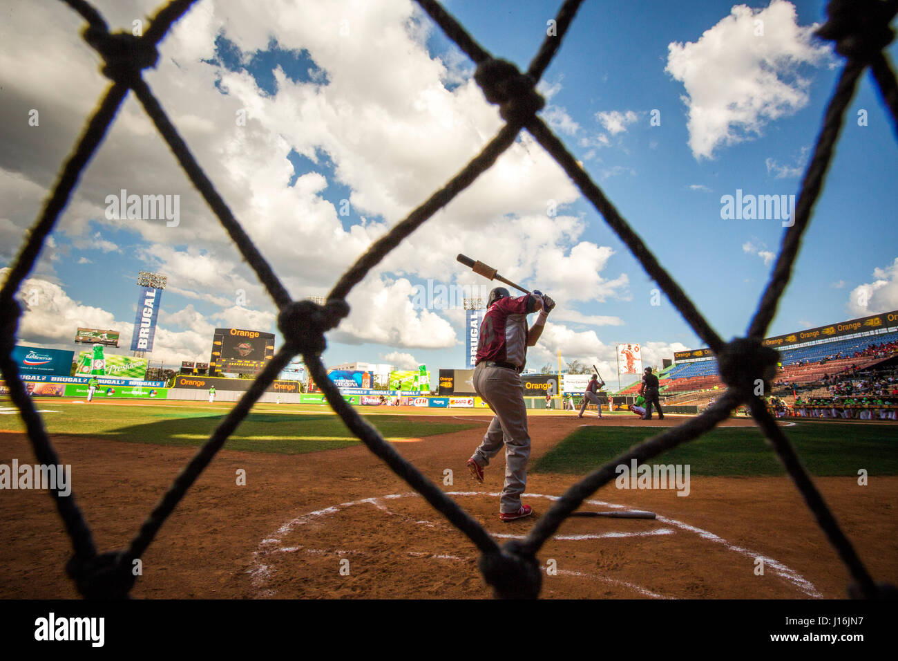 A Professional Baseball Player Takes A Practice Swing In The On-deck ...