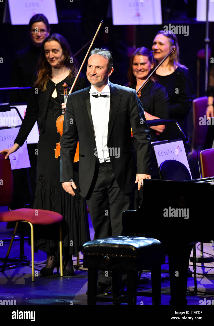 Pianist Simon Trpceski takes a bow after he performs with The ...