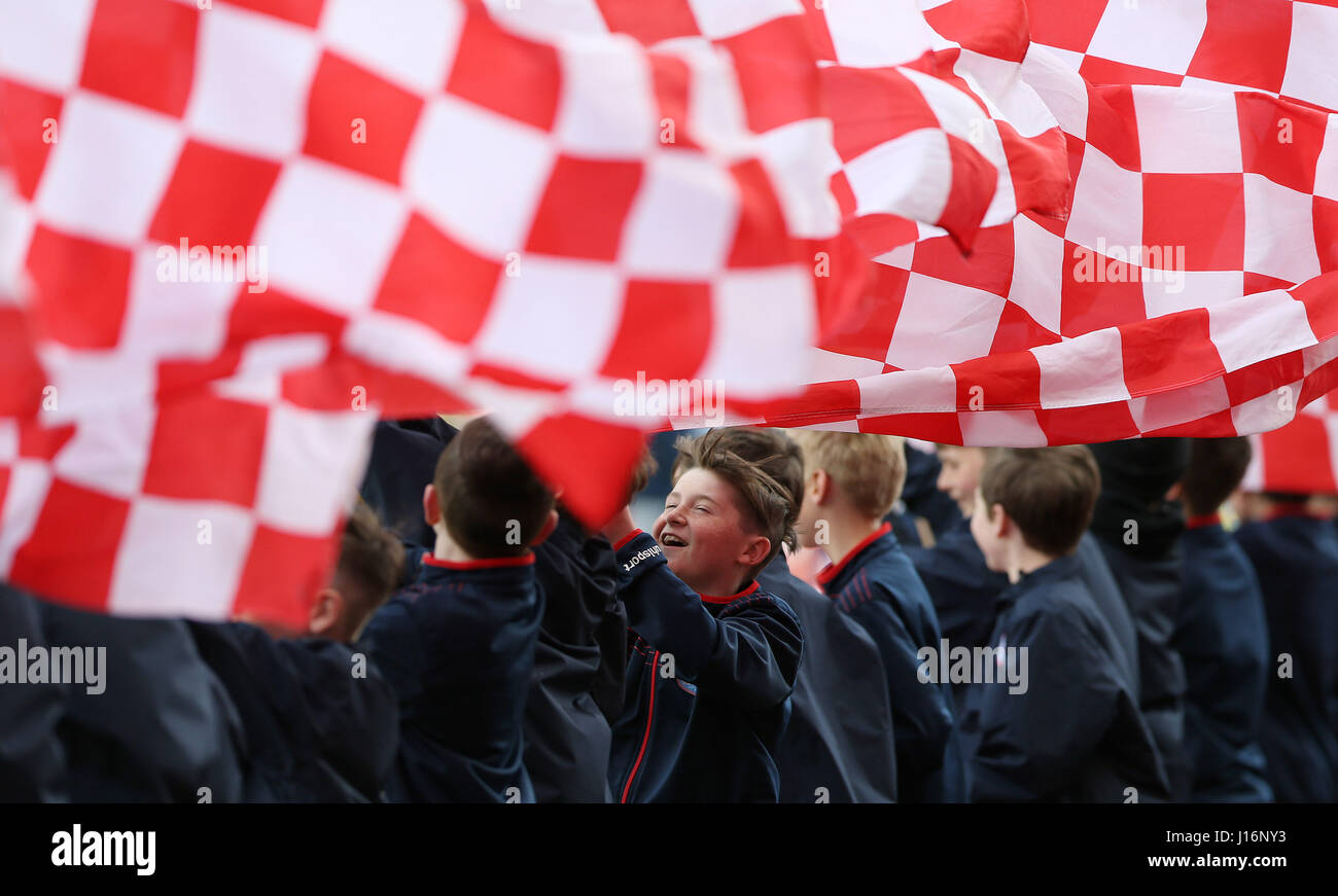 Stoke City's young flag bearers wave their Stoke City flags during the ...