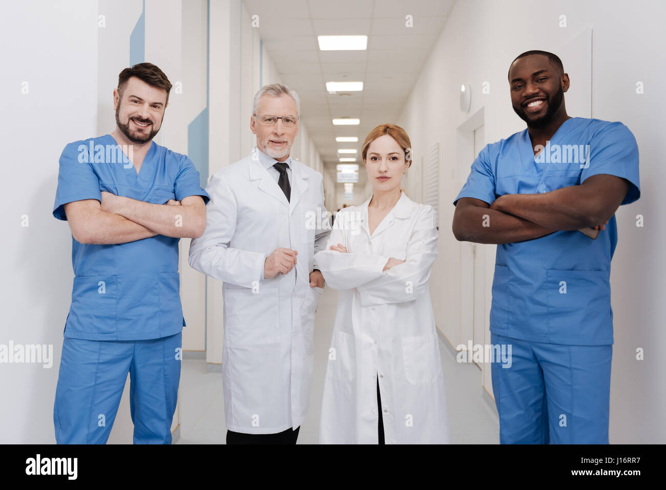 Cheerful doctors smiling in the clinic Stock Photo - Alamy