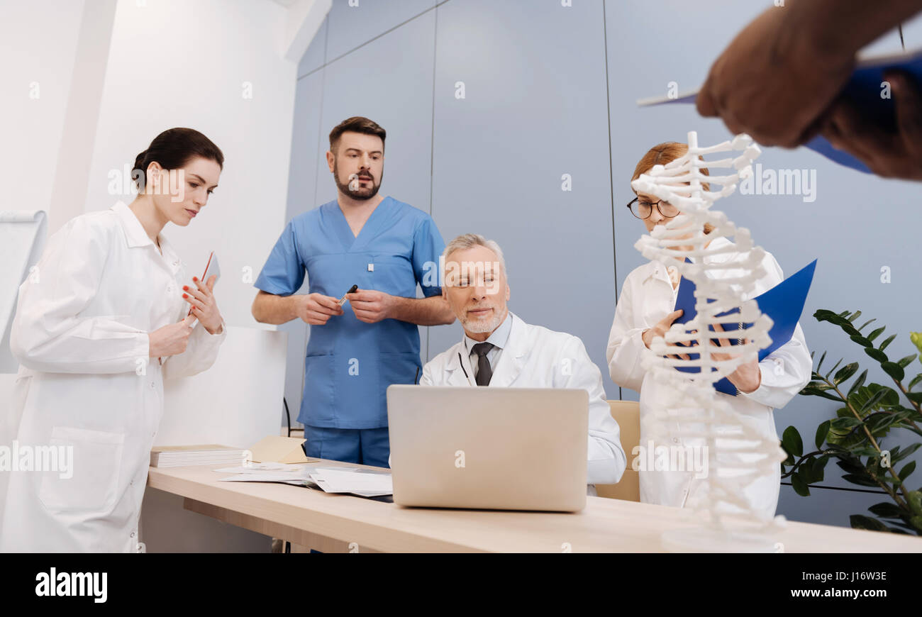 Gifted interns enjoying lecture of the mentor in medical university ...