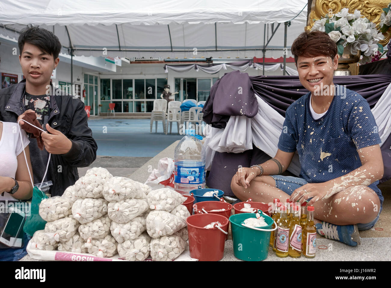 Songkran Thailand. Young Thai people selling white powder at Thailand ...