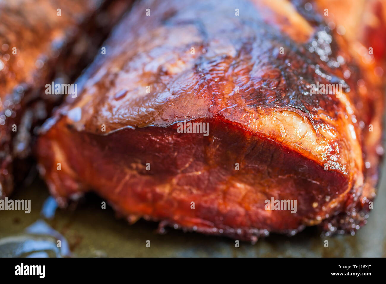 Close-up of freshly hot smoked, boneless pork chops or cutlets cooling ...