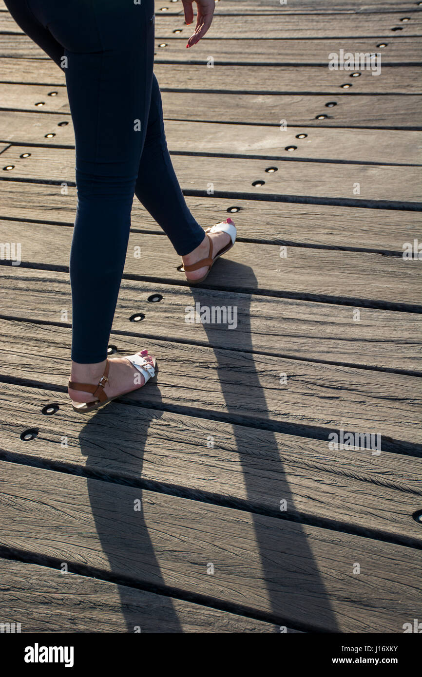 Woman's legs and back view hi-res stock photography and images - Alamy