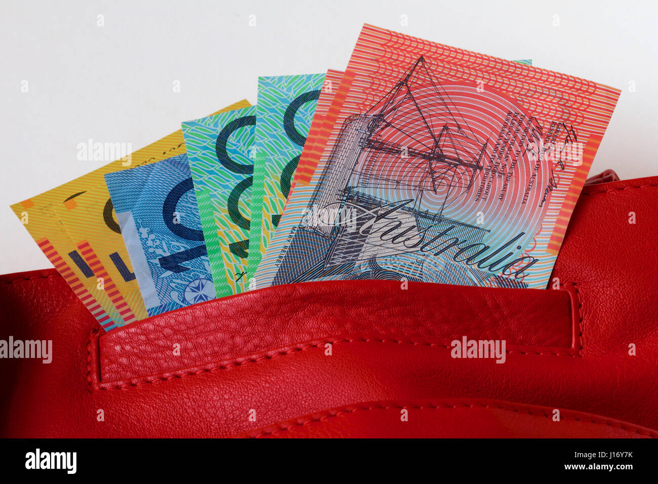 Australian dollar notes in a red leather bag Stock Photo - Alamy