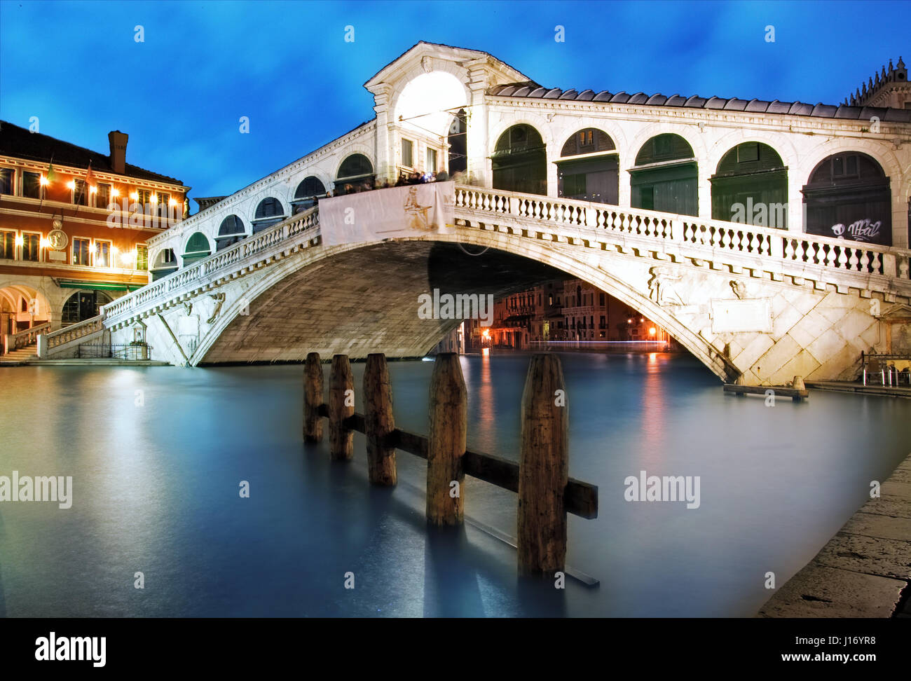 Along Rialto Bridge, Venice at dramatic sunset Stock Photo - Alamy