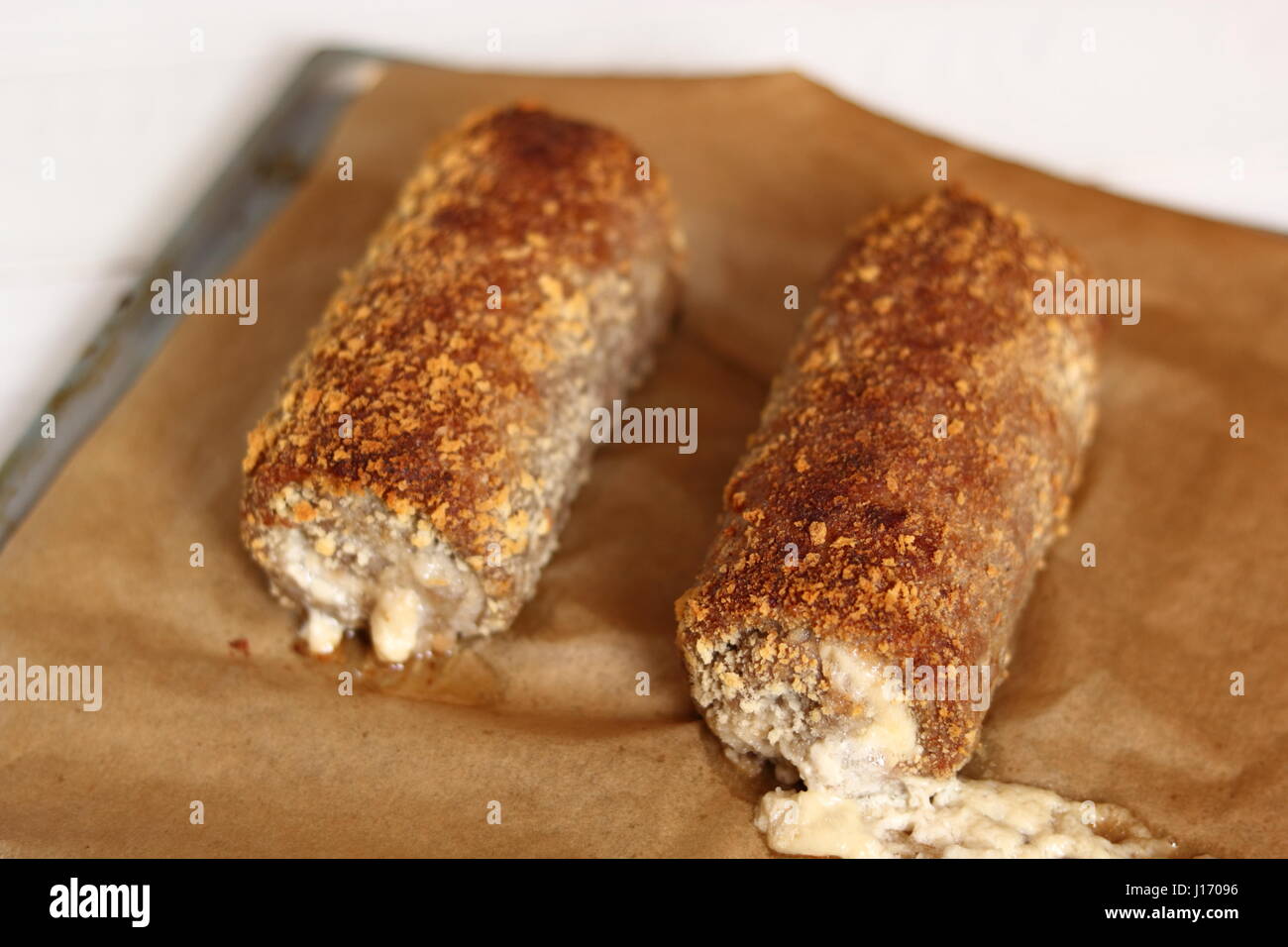 Meat roulade. Rolled meat with a filling of cheese and ham Stock Photo ...